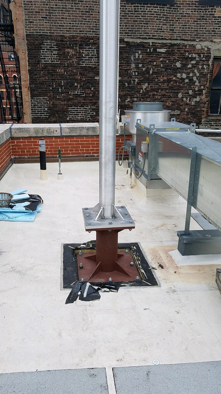 Rooftop flagpole installation - NYC Flag Repair